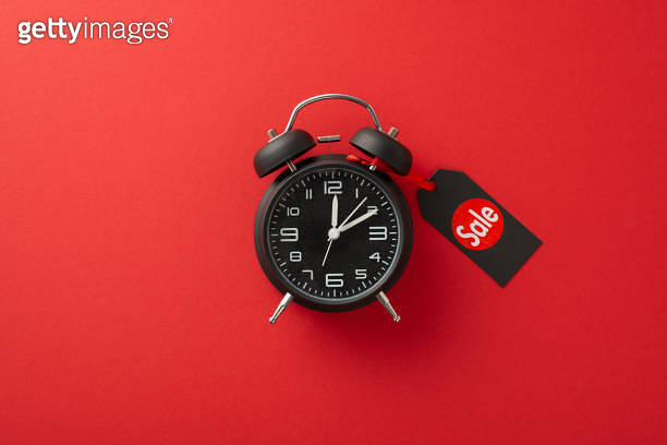 Tick-tock, Black Friday o'clock! A top view image of black alarm clock ...