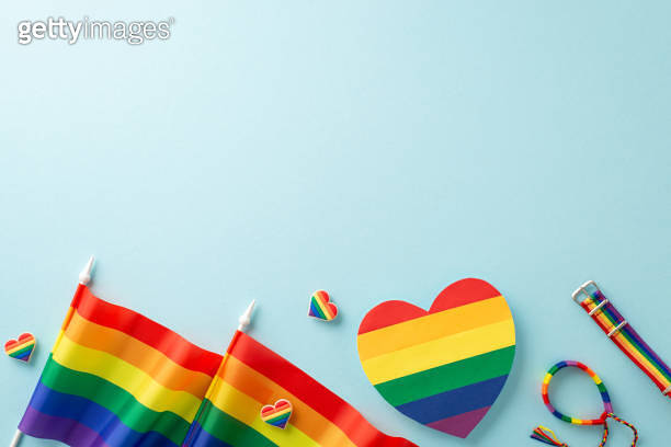 Celebrating LGBTQ+ Pride Month in July with vibrant pride flags and ...