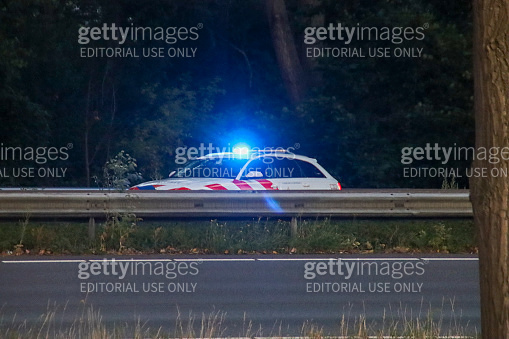 Police car on highway with flashing blue light after accident 이미지 ...