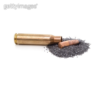 Cartridge case and a pile of gunpowder. 이미지 (1455046514) - 게티이미지뱅크