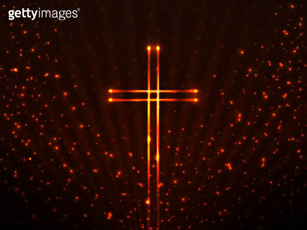 Glowing christian cross on background glitter particles and glowing ...