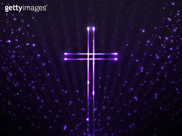 Glowing christian cross on background glitter particles and glowing ...