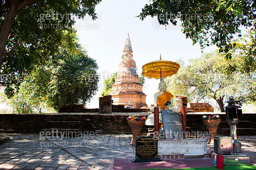 Ancient antique buddha statue and ruins old chedi stupa in Wat Phra ...