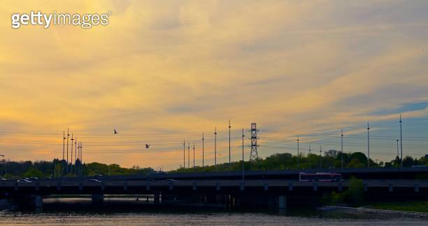 Aerial shot bridge over lake at sunset Sunset on lake bridge as a ...
