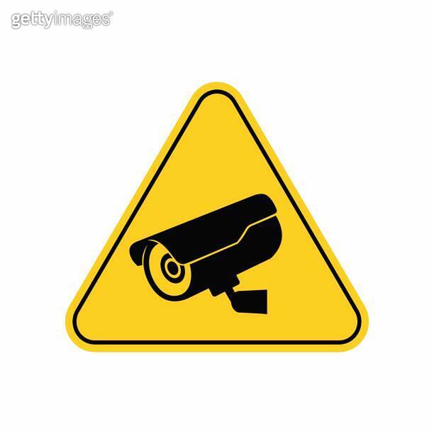 CCTV camera sign. Yellow triangles indicate camera operation ...