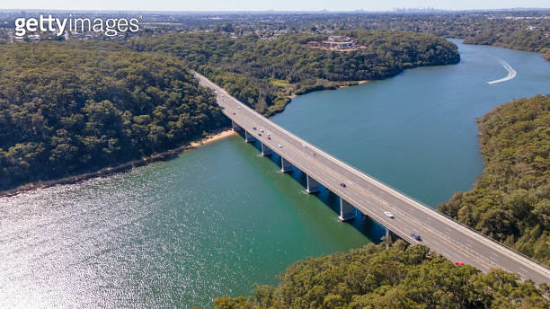 Aerial drone view rising up over Alfords Point Bridge across Georges ...