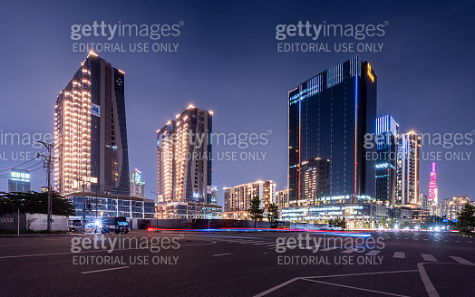 Night view of The Hallmark and many buildings, near Bason bridge and ...