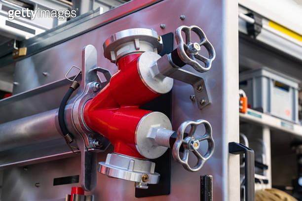 Fragment of the inside of a fire engine with valves for connecting ...