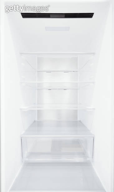 An empty refrigerator. Inside an empty, clean refrigerator, a ...