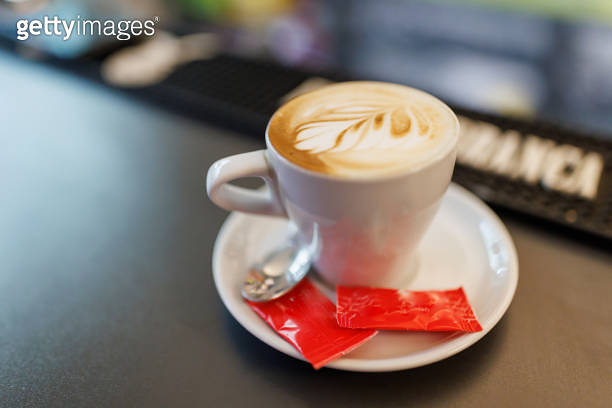 Hot coffee with beautiful latte art topping serve on table (1452760926 ...