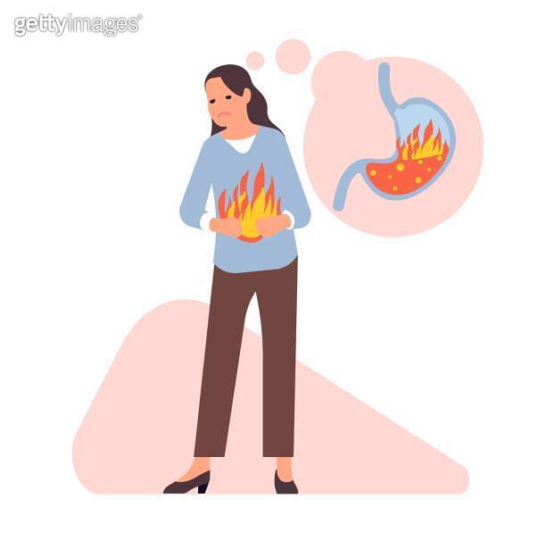 Young woman suffers from heartburn. Girl with digestive problem ...