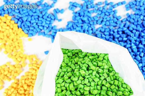 Plastic factory laboratory. colored dye in granules for plastics ...