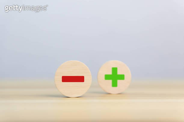 circular wooden block Show plus and minus signs. select the minus sign ...