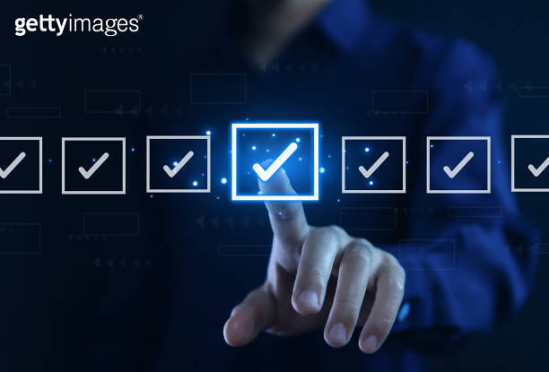 Place a check mark on the box in the list. checklist concept Business ...