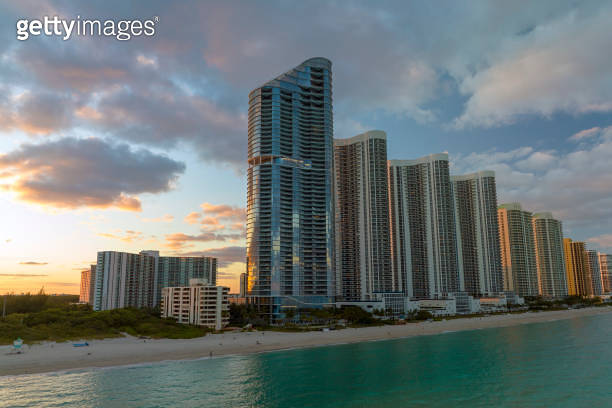 Evening landscape of sandy beachfront in Sunny Isles Beach city with ...