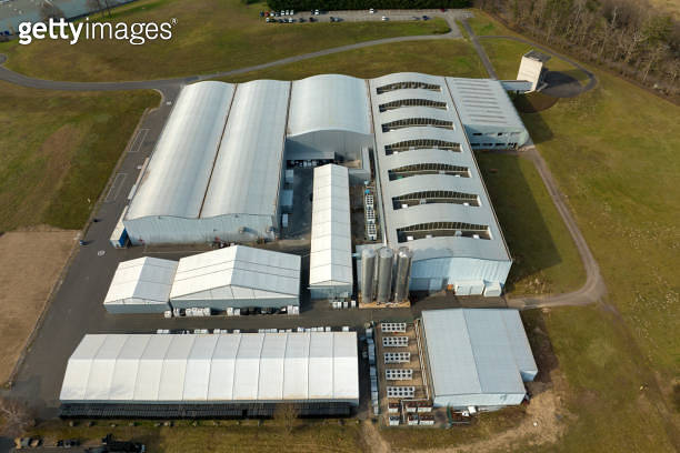 Aerial view of new factory building for producing and shipping of ...