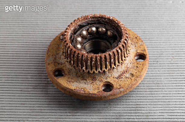 Old rusty wheel hub with a broken bearing. Bearing jamming. Automotive ...