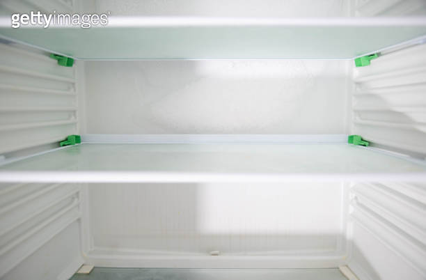 Ice and snow build up on the back wall of the refrigerator ...