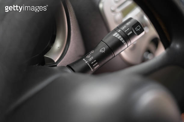 Car interior with light switch. Headlight switch, Turn signal lever ...