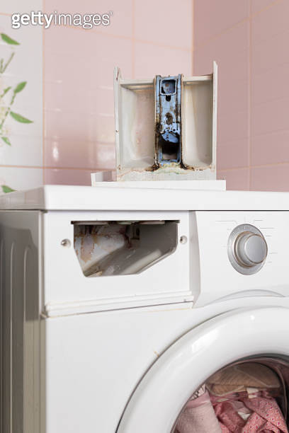 Washing machine with empty space for detergent compartment drawer with ...