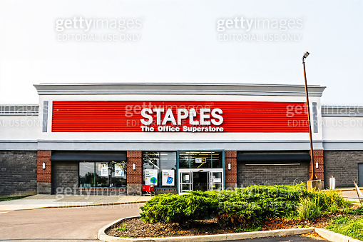 Front of Staples-The Office Superstore with doors open and shopping ...