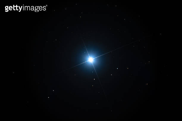 Night sky background with bright Sirius star on black sky with stars ...