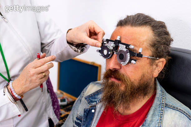 Optician and optometrist. Eye doctor helps your patient with their ...