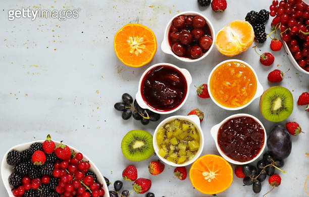 various types of jams and preserves from different berries (1785877649 ...