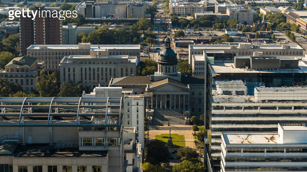 Government building stands on Main Street amidst office buildings in ...