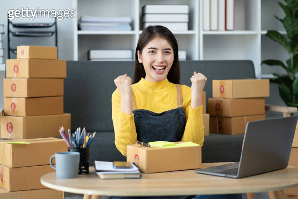 Small business owner feeling happy after receive many orders from ...