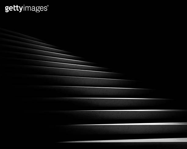 Black background. Stone stairs with abstract light. Steps in the ...