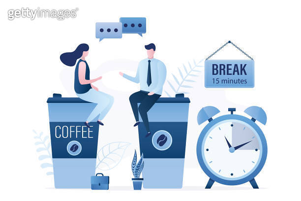 Office workers sit on large mugs of coffee and talk. Alarm clock and ...