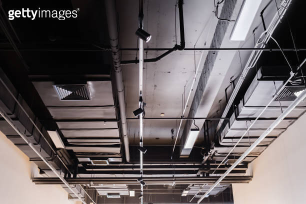 Building concept, structural beam, ceiling, ventilation duct, electric ...