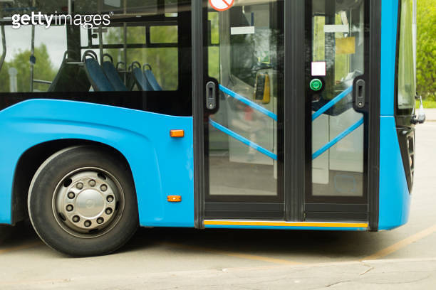 Blue bus. Public transport at bus stop. Details of transport ...