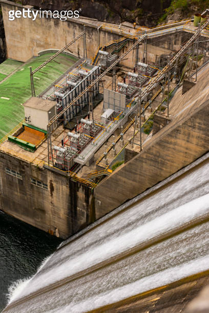Waterfall with hydroelectric plant 이미지 (1708550071) - 게티이미지뱅크