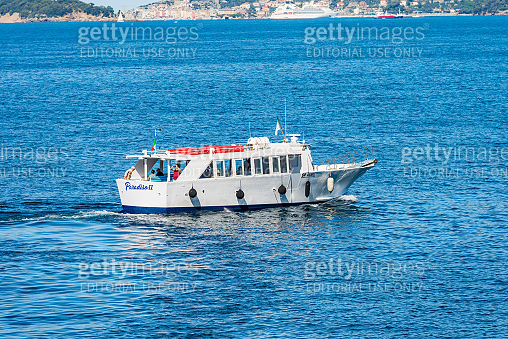 Small White Ferry with Tourists in the Mediterranean Sea, Gulf of La ...