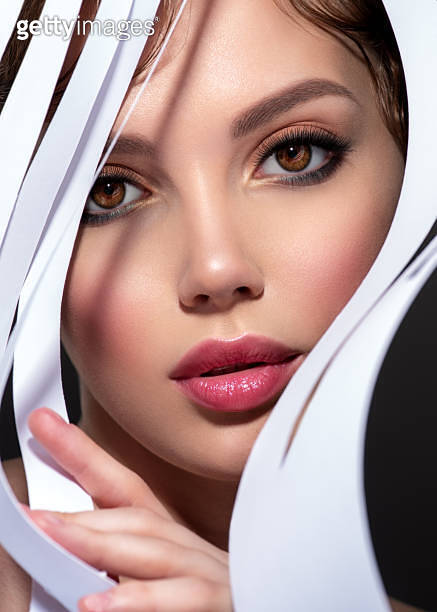 Art portrait of beautiful young woman with brown makeup. Beautiful ...