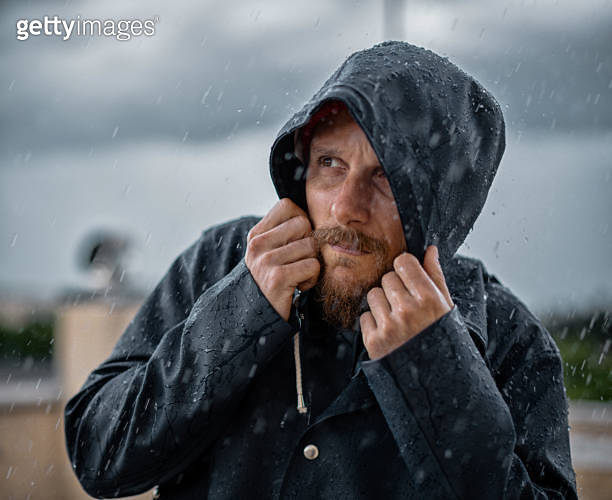 Bearded man portrait: with raincoat under the rain 이미지 (1460548569 ...