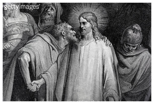 Judas Iscariot holding and kissing Jesus Christ in the garden of ...