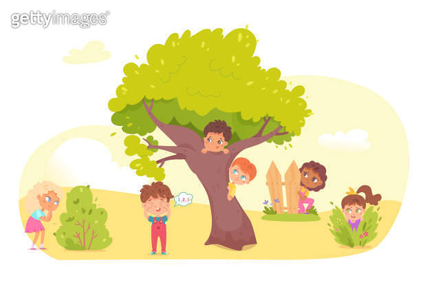 Little kids playing hide and seek in park. Playing game with friends ...