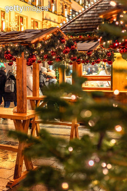 German Christmas market wood chalet house with Christmas lights and ...