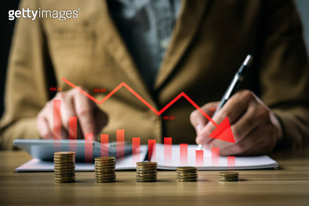 Economic crisis concept, businessman with falling financial graph chart ...