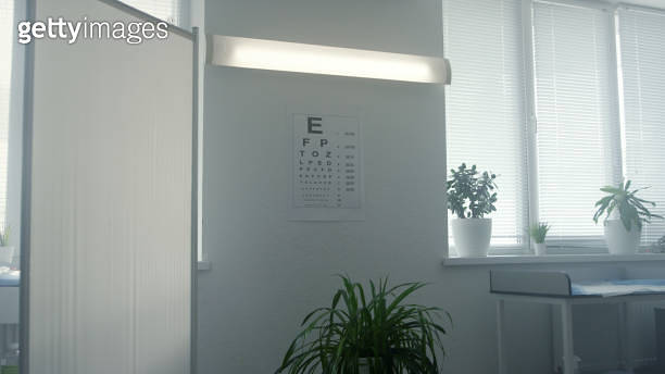 Standard eyesight test chart hanging white wall in doctor office close ...