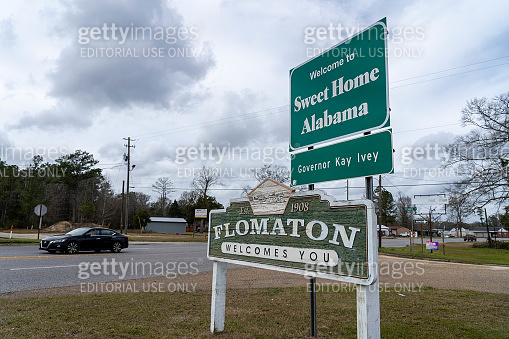 Signs welcome travelers across the Alabama state line and into the city ...
