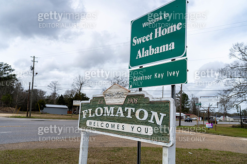 Signs welcome travelers across the Alabama state line and into the city ...