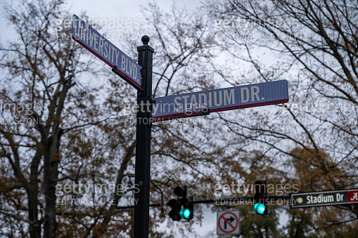 Street sign at the corner of University Boulevard and Stadium Drive on ...