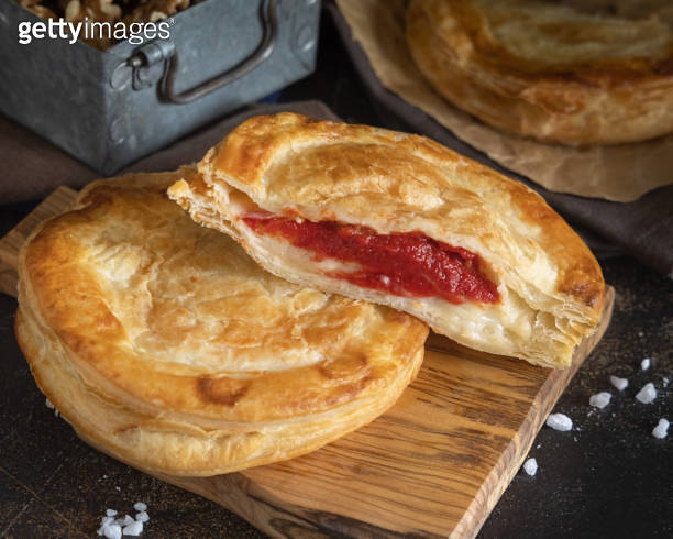 Rustico puff pastry from Lecce filled with stuffed with tomato ...