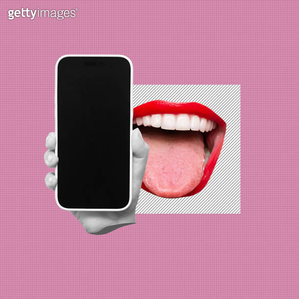 Women's wide open mouth with red lips showing tongue holds enlarged ...
