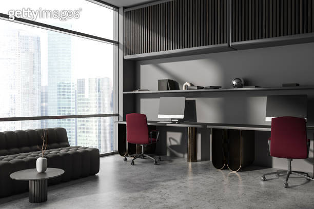 Grey office interior with coworking and relaxing corner near panoramic ...