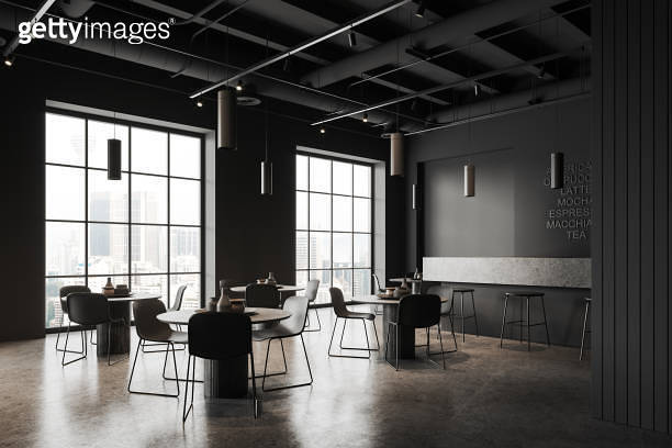 Corner of modern coffee shop with dark gray walls, concrete floor, gray ...